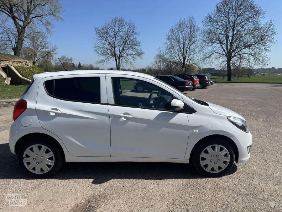 White Opel Karl 2015 in Kaunas, with an engine capacity of 1.00 L and mileage of 231 thousand km for 3350 €, photo 4 on AUTOMOTO.COM.LV