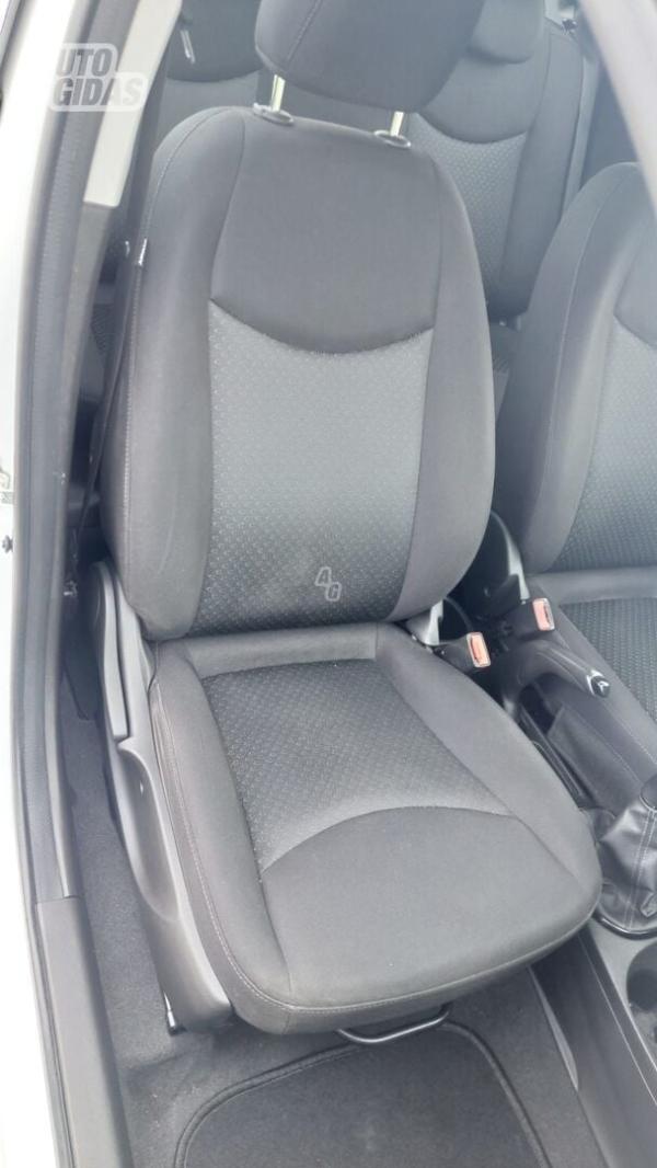 White Opel Karl 2015 in Kaunas, with an engine capacity of 1.00 L and mileage of 179 thousand km for 3900 €, photo 5 on AUTOMOTO.COM.LV