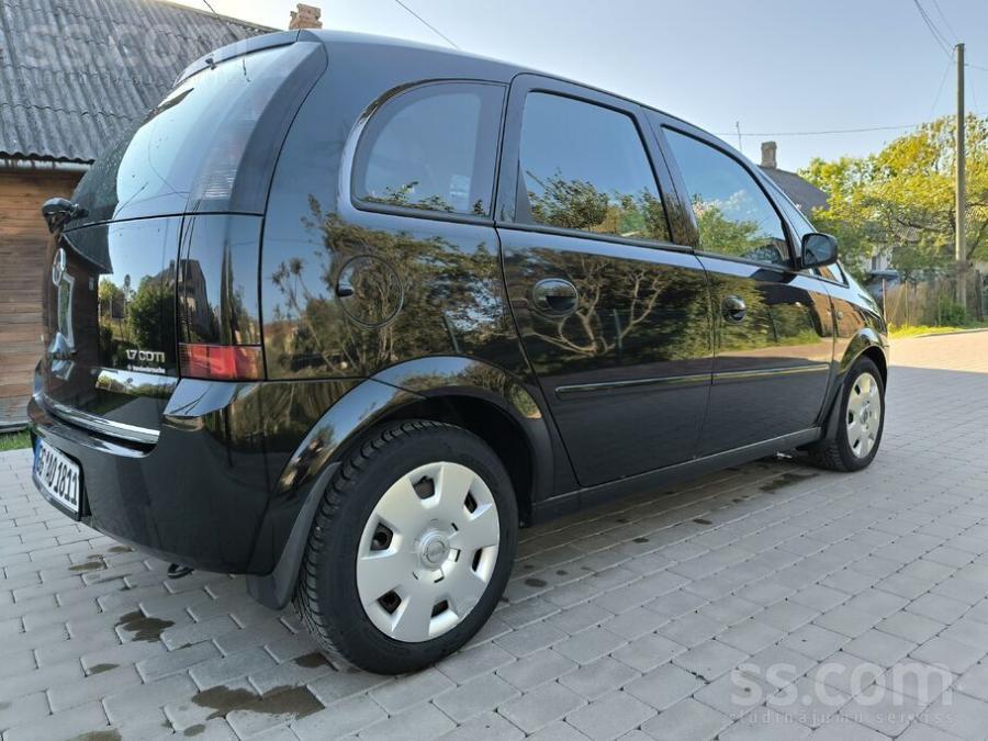 Melns Opel Meriva 2006 Ludza, ar dzinēja tilpumu 1.70 L un nobraukumu 208 tūkst. km par 2550 €, foto 5 vietnē AUTOMOTO.COM.LV