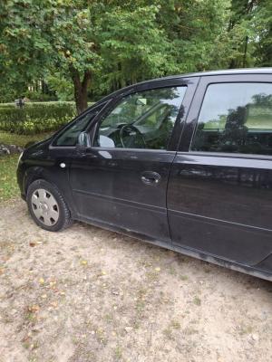 Melns Opel Meriva 2006 Rīga, ar dzinēja tilpumu 1.80 L un nobraukumu 305 tūkst. km par 1000 €, foto 3 vietnē AUTOMOTO.COM.LV