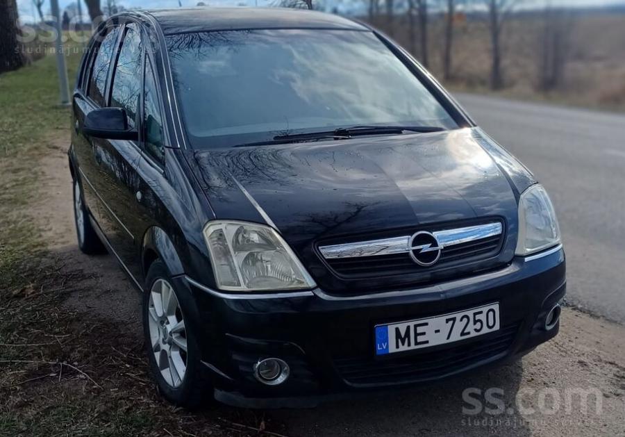 Black Opel Meriva 2007 in Daugavpils, with an engine capacity of 1.70 L and mileage of 305 thousand km for 1400 €, photo 1 on AUTOMOTO.COM.LV