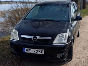 Black Opel Meriva 2007 in Daugavpils, with an engine capacity of 1.70 L and mileage of 305 thousand km for 1400 €, photo 3 on AUTOMOTO.COM.LV