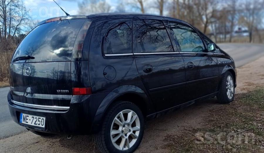 Black Opel Meriva 2007 in Daugavpils, with an engine capacity of 1.70 L and mileage of 305 thousand km for 1400 €, photo 4 on AUTOMOTO.COM.LV