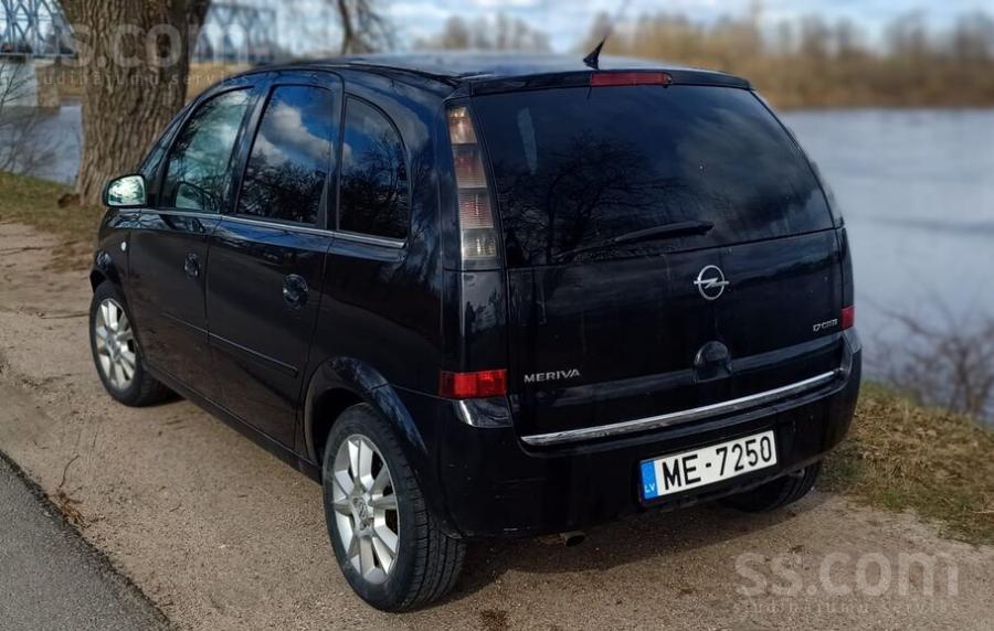 Black Opel Meriva 2007 in Daugavpils, with an engine capacity of 1.70 L and mileage of 305 thousand km for 1400 €, photo 5 on AUTOMOTO.COM.LV