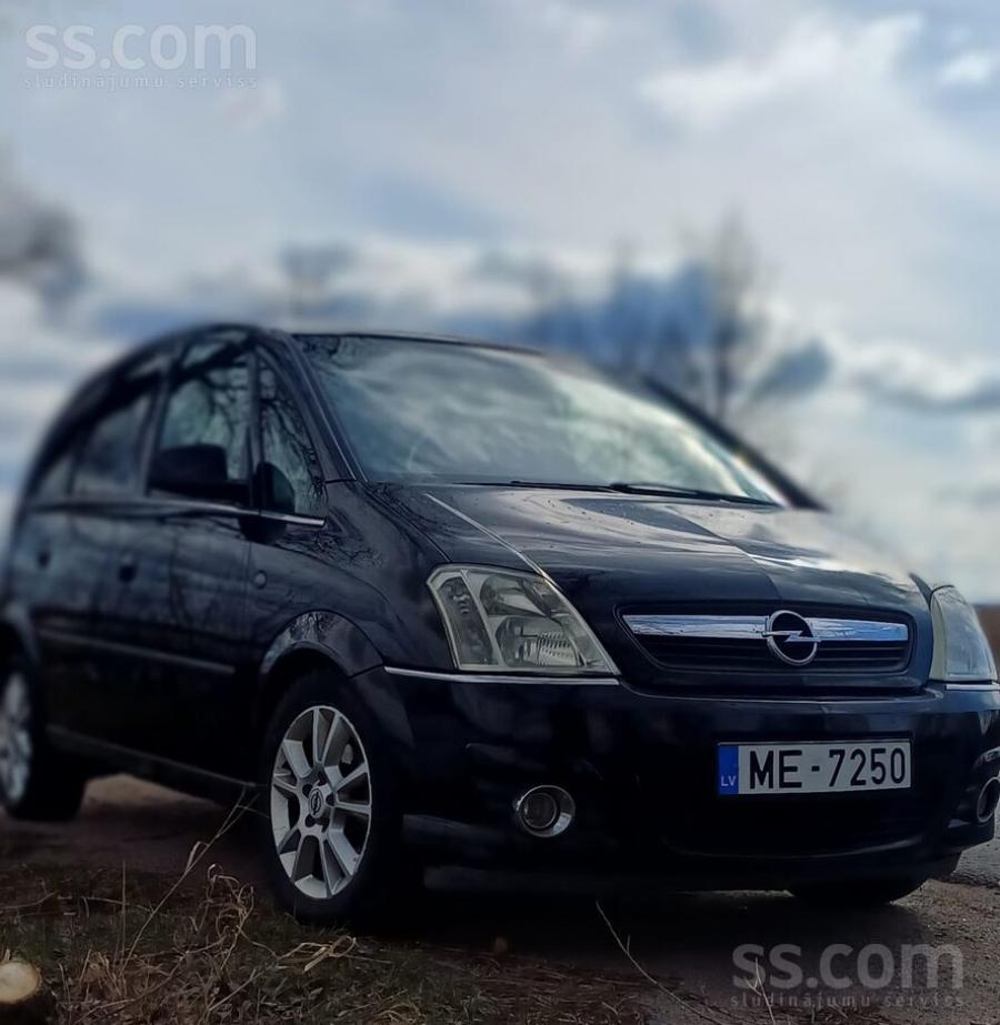 Black Opel Meriva 2007 in Daugavpils, with an engine capacity of 1.70 L and mileage of 305 thousand km for 1400 €, photo 6 on AUTOMOTO.COM.LV