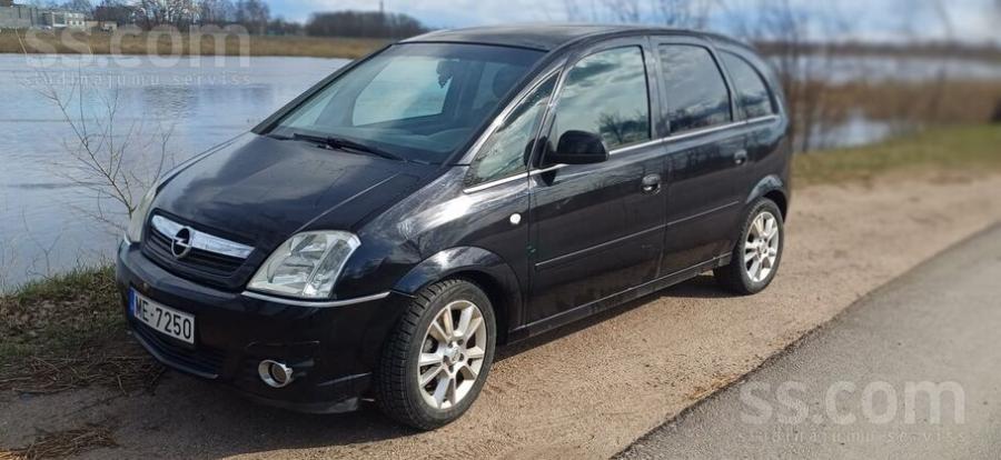 Black Opel Meriva 2007 in Daugavpils, with an engine capacity of 1.70 L and mileage of 305 thousand km for 1400 €, photo 7 on AUTOMOTO.COM.LV