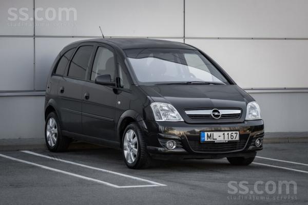 Black Opel Meriva 2007 in Riga, with an engine capacity of 1.70 L and mileage of 250 thousand km for 1350 €, photo 4 on AUTOMOTO.COM.LV