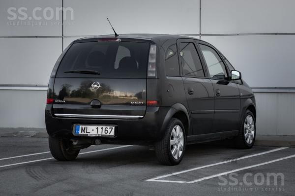 Black Opel Meriva 2007 in Riga, with an engine capacity of 1.70 L and mileage of 250 thousand km for 1350 €, photo 5 on AUTOMOTO.COM.LV