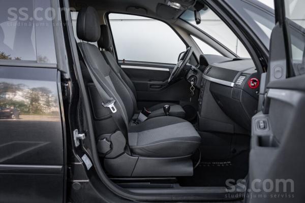 Black Opel Meriva 2007 in Riga, with an engine capacity of 1.70 L and mileage of 250 thousand km for 1350 €, photo 11 on AUTOMOTO.COM.LV