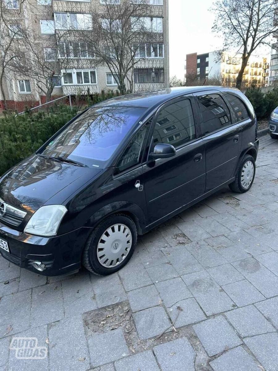 Black Opel Meriva 2008 in Vilnius, with an engine capacity of 1.70 L and mileage of 321 thousand km for 1000 €, photo 1 on AUTOMOTO.COM.LV