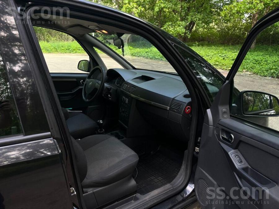 Black Opel Meriva 2008 in Riga, with an engine capacity of 1.40 L and mileage of 0 thousand km for 2250 €, photo 17 on AUTOMOTO.COM.LV