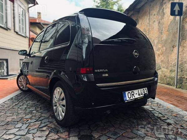 Melns Opel Meriva 2008 Cēsis, ar dzinēja tilpumu 1.60 L un nobraukumu 0 tūkst. km par 3350 €, foto 8 vietnē AUTOMOTO.COM.LV
