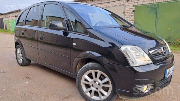 Black Opel Meriva 2009 in Daugavpils, with an engine capacity of 1.60 L and mileage of 179 thousand km for 1500 €, photo 6 on AUTOMOTO.COM.LV