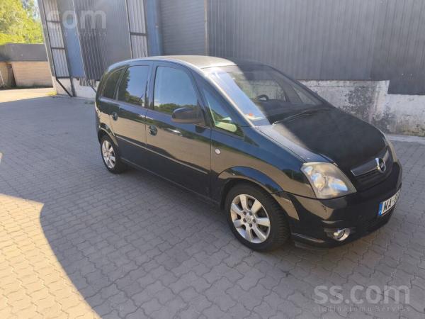 Melns Opel Meriva 2009 Liepāja, ar dzinēja tilpumu 1.70 L un nobraukumu 248 tūkst. km par 1800 €, foto 2 vietnē AUTOMOTO.COM.LV
