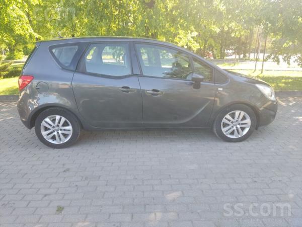 Melns Opel Meriva 2011 Ogre, ar dzinēja tilpumu 1.70 L un nobraukumu 0 tūkst. km par 3650 €, foto 5 vietnē AUTOMOTO.COM.LV
