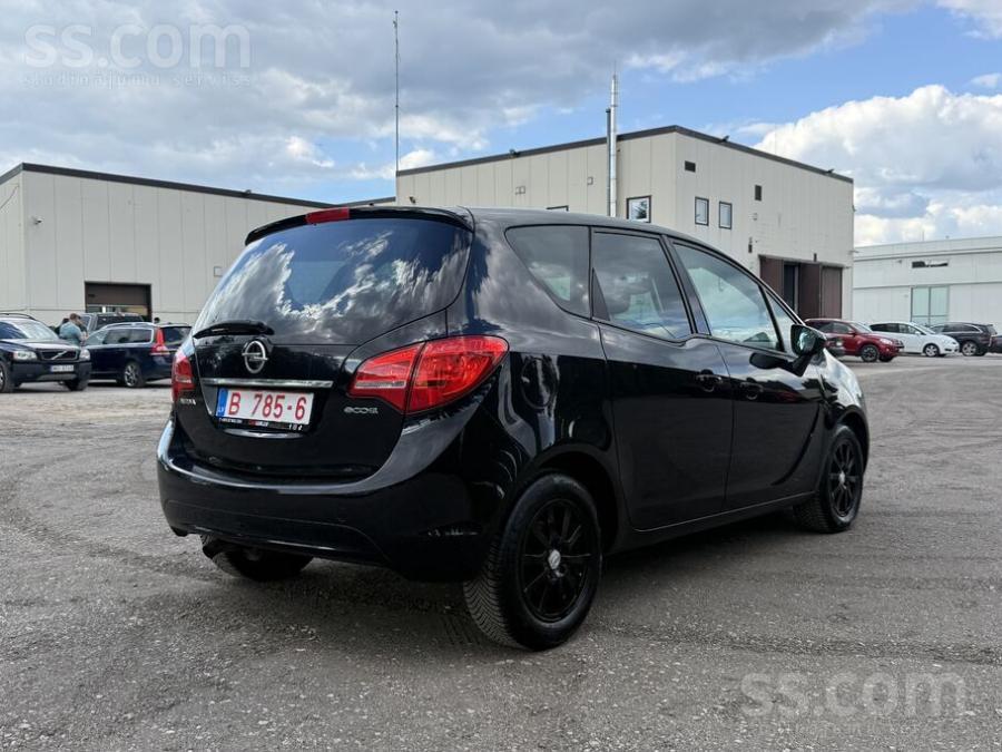 Black Opel Meriva 2011 in Liepaja, with an engine capacity of 1.40 L and mileage of 177 thousand km for 4600 €, photo 3 on AUTOMOTO.COM.LV