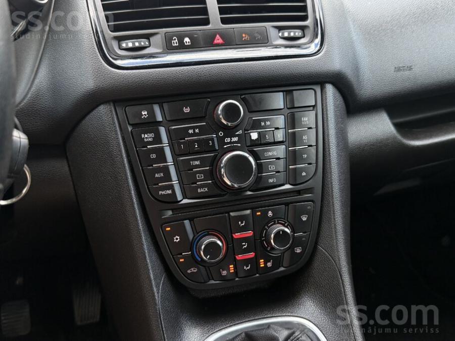Black Opel Meriva 2011 in Liepaja, with an engine capacity of 1.40 L and mileage of 177 thousand km for 4600 €, photo 24 on AUTOMOTO.COM.LV