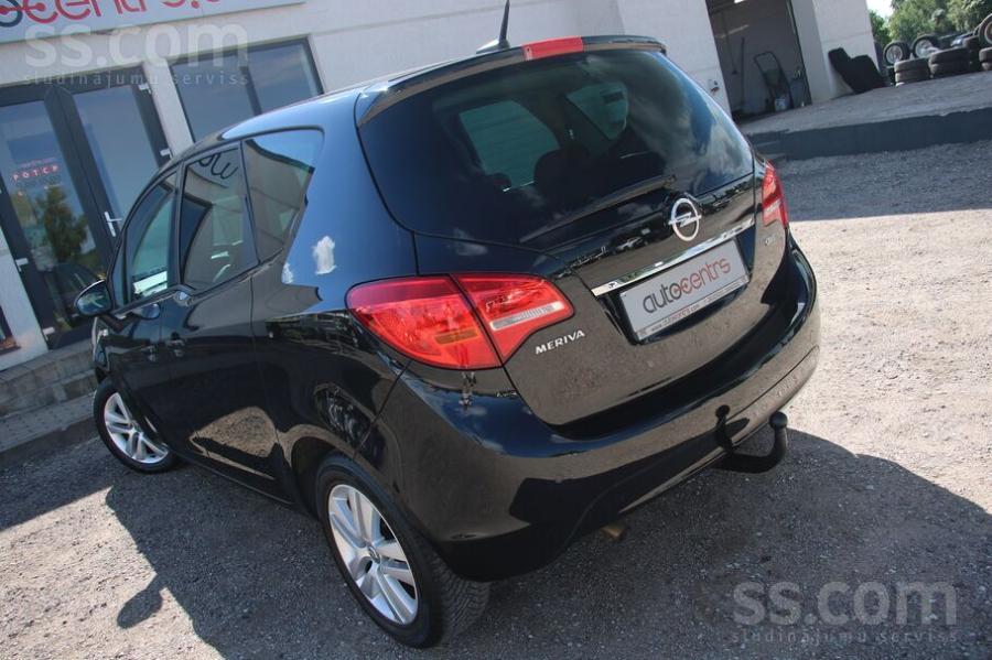 Black Opel Meriva 2011 in Tukums, with an engine capacity of 1.70 L and mileage of 266 thousand km for 4686 €, photo 5 on AUTOMOTO.COM.LV