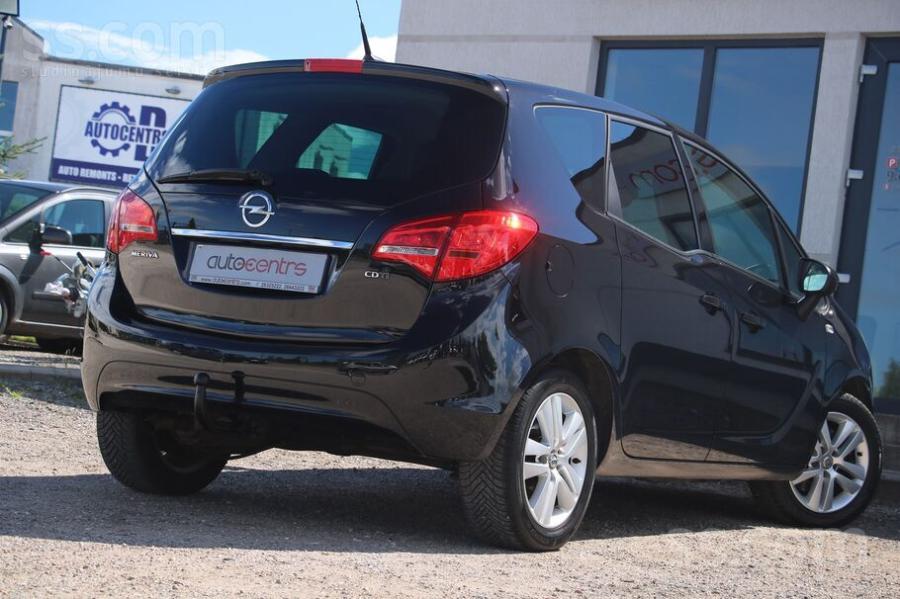 Black Opel Meriva 2011 in Tukums, with an engine capacity of 1.70 L and mileage of 266 thousand km for 4686 €, photo 6 on AUTOMOTO.COM.LV