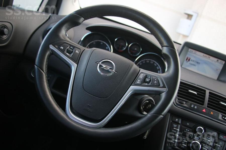 Black Opel Meriva 2011 in Tukums, with an engine capacity of 1.70 L and mileage of 266 thousand km for 4686 €, photo 21 on AUTOMOTO.COM.LV
