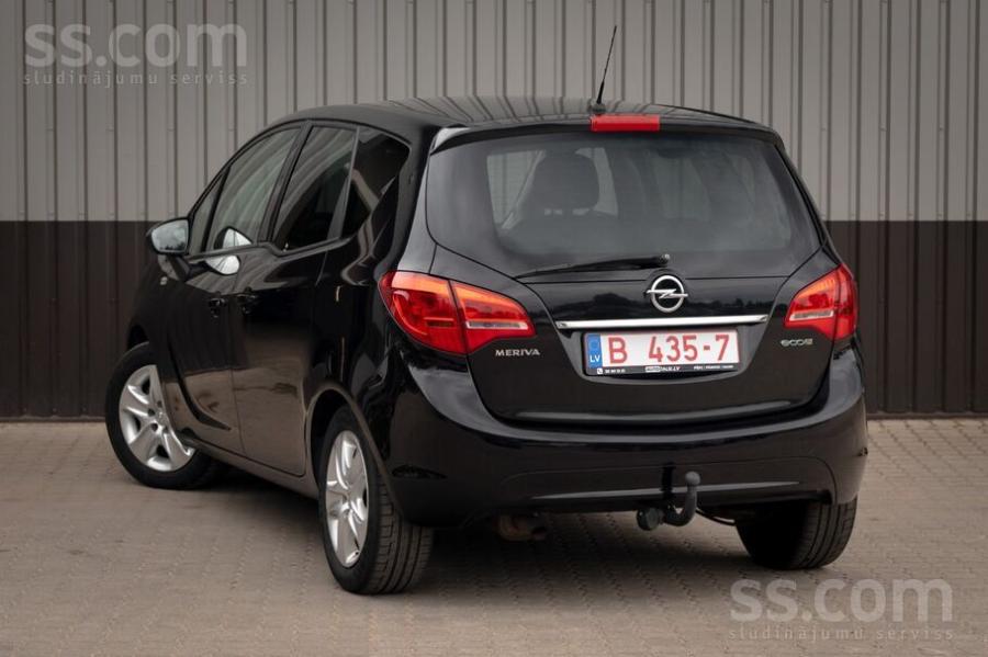 Black Opel Meriva 2011 in Talsi, with an engine capacity of 1.40 L and mileage of 132 thousand km for 5490 €, photo 5 on AUTOMOTO.COM.LV