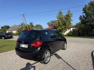 Black Opel Meriva 2011 in Ventspils, with an engine capacity of 1.70 L and mileage of 190 thousand km for 2990 €, photo 5 on AUTOMOTO.COM.LV