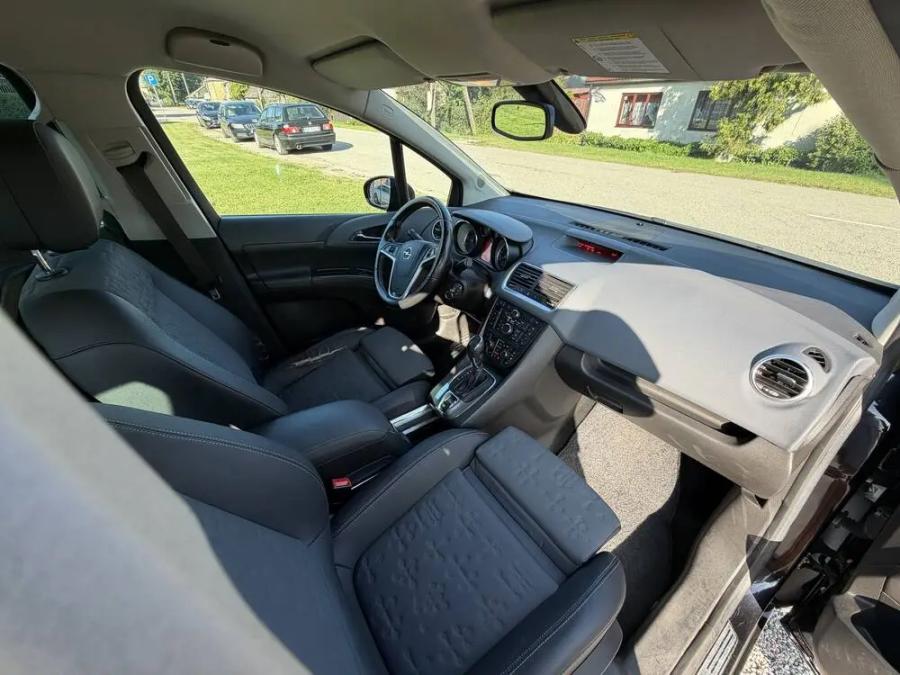 Black Opel Meriva 2011 in Ventspils, with an engine capacity of 1.70 L and mileage of 190 thousand km for 2990 €, photo 12 on AUTOMOTO.COM.LV