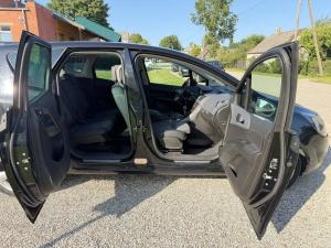 Black Opel Meriva 2011 in Ventspils, with an engine capacity of 1.70 L and mileage of 190 thousand km for 2990 €, photo 13 on AUTOMOTO.COM.LV