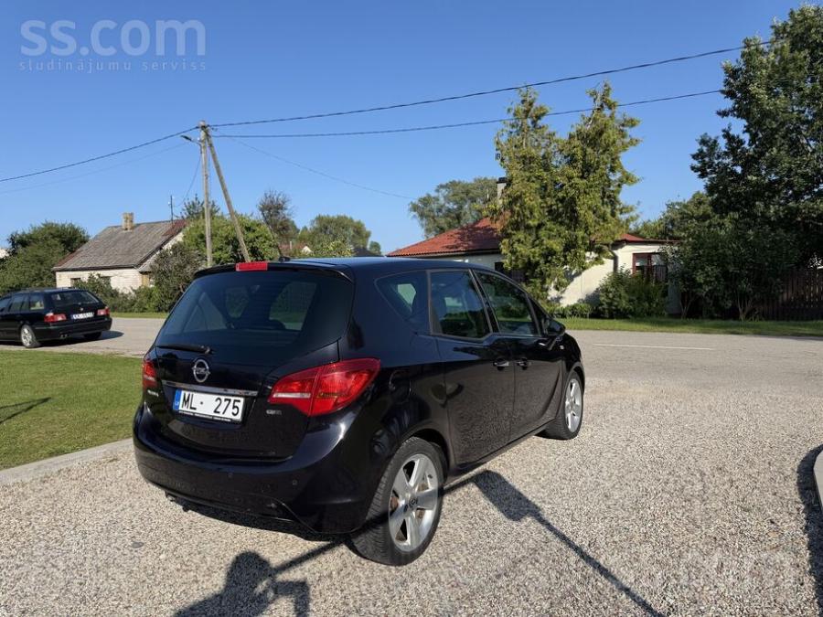 Black Opel Meriva 2011 in Ventspils, with an engine capacity of 1.70 L and mileage of 190 thousand km for 2990 €, photo 5 on AUTOMOTO.COM.LV
