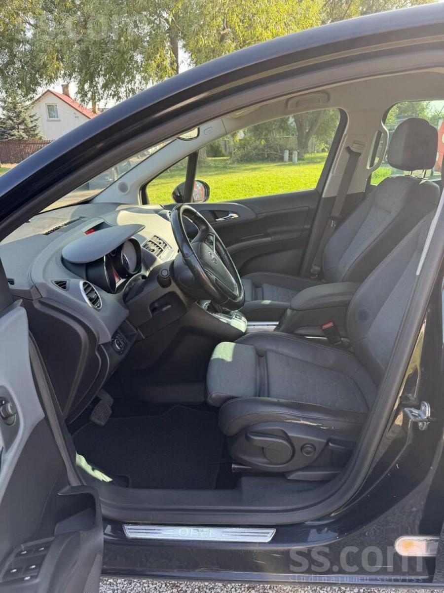 Black Opel Meriva 2011 in Ventspils, with an engine capacity of 1.70 L and mileage of 190 thousand km for 2990 €, photo 8 on AUTOMOTO.COM.LV