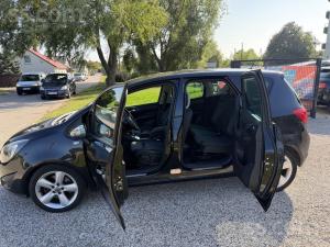 Black Opel Meriva 2011 in Ventspils, with an engine capacity of 1.70 L and mileage of 190 thousand km for 2990 €, photo 24 on AUTOMOTO.COM.LV