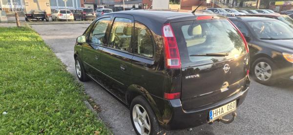 Black Opel Meriva 2003 in Klaipeda, with an engine capacity of 1.60 L and mileage of 179 thousand km for 1000 €, photo 5 on AUTOMOTO.COM.LV
