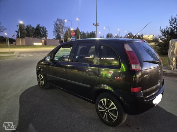 Black Opel Meriva 2004 in Siauliai, with an engine capacity of 1.70 L and mileage of 212 thousand km for 650 €, photo 3 on AUTOMOTO.COM.LV