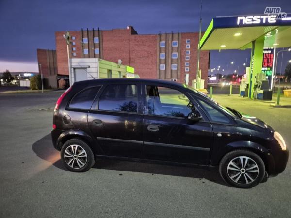 Black Opel Meriva 2004 in Siauliai, with an engine capacity of 1.70 L and mileage of 212 thousand km for 650 €, photo 6 on AUTOMOTO.COM.LV