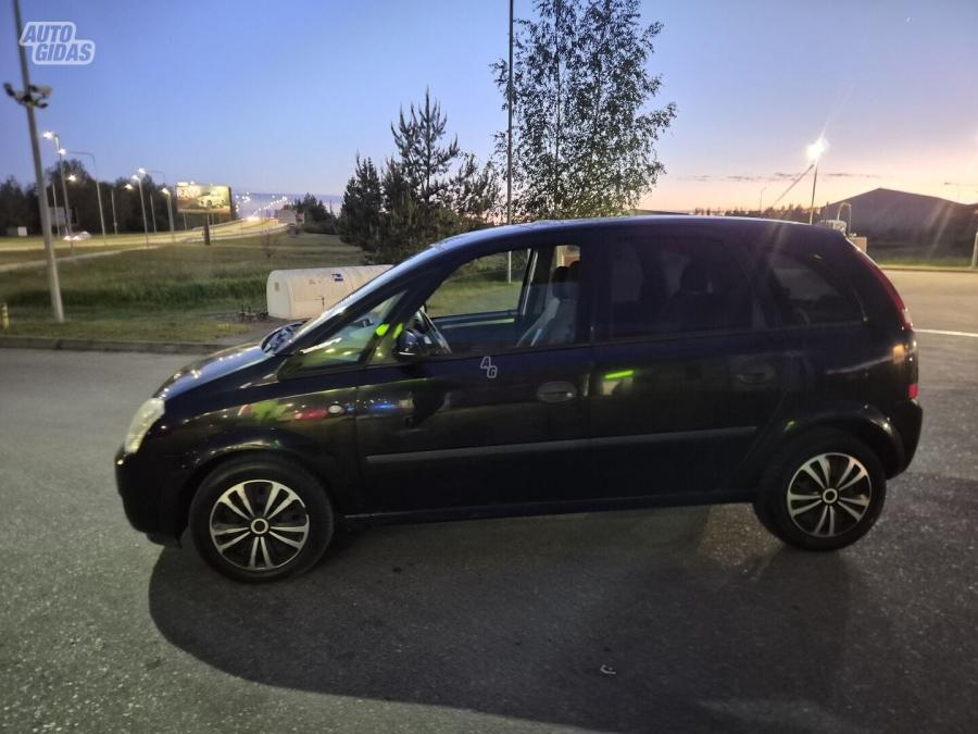 Black Opel Meriva 2004 in Siauliai, with an engine capacity of 1.70 L and mileage of 212 thousand km for 650 €, photo 3 on AUTOMOTO.COM.LV