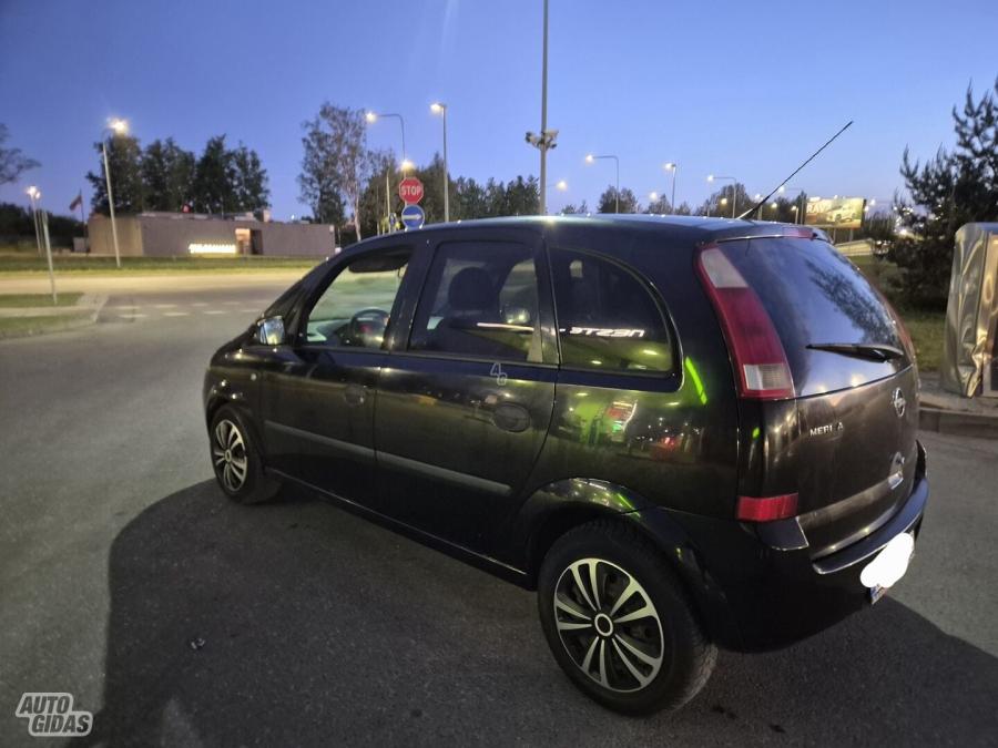 Black Opel Meriva 2004 in Siauliai, with an engine capacity of 1.70 L and mileage of 212 thousand km for 650 €, photo 4 on AUTOMOTO.COM.LV