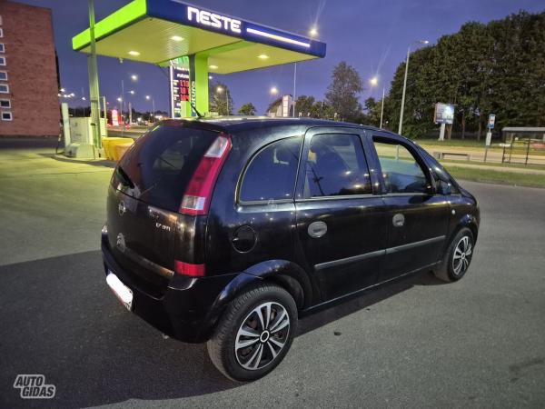 Black Opel Meriva 2004 in Siauliai, with an engine capacity of 1.70 L and mileage of 212 thousand km for 650 €, photo 4 on AUTOMOTO.COM.LV