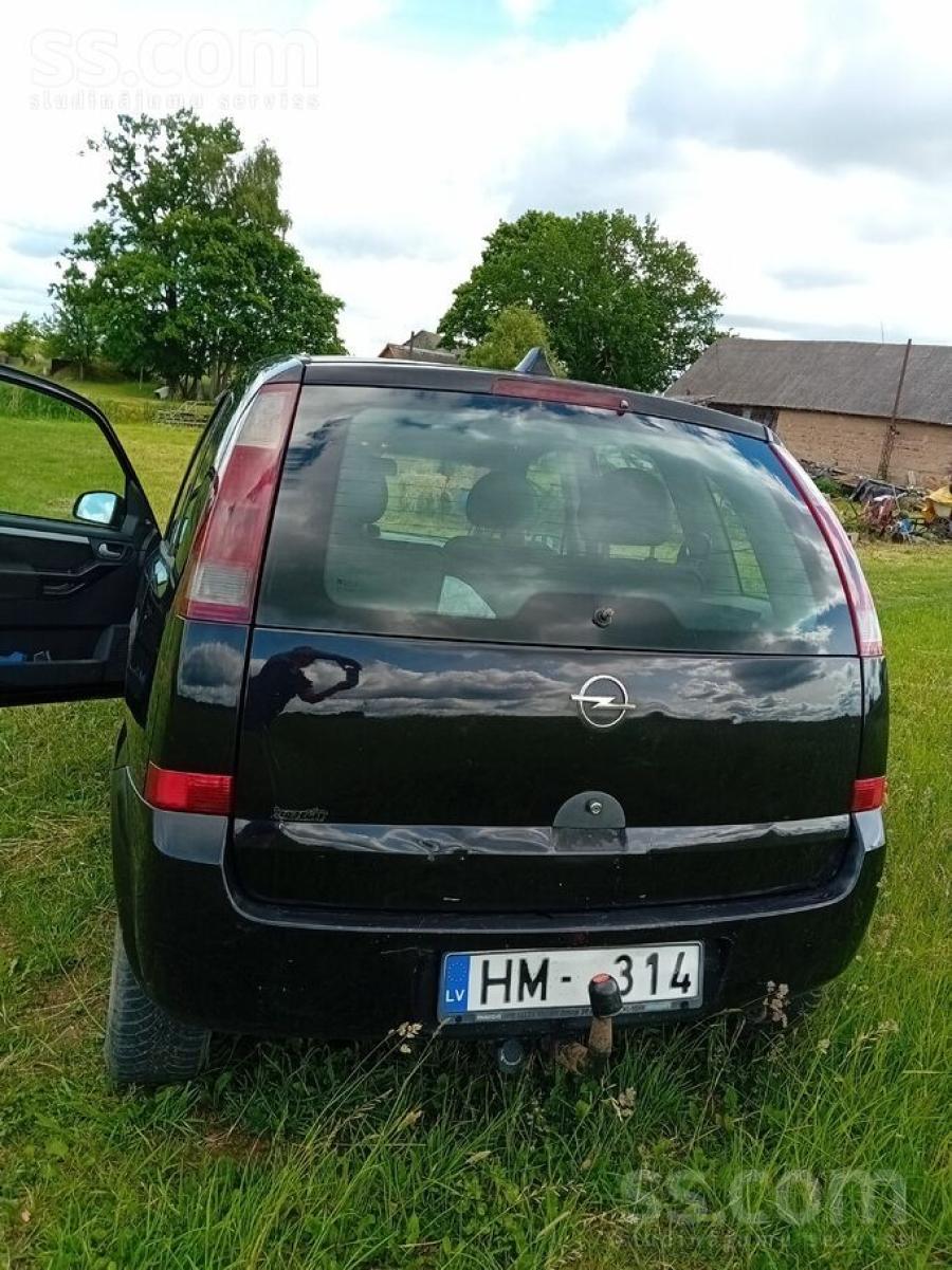Black Opel Meriva 2004 in Dobele, with an engine capacity of 1.70 L and mileage of 0 thousand km for 640 €, photo 3 on AUTOMOTO.COM.LV