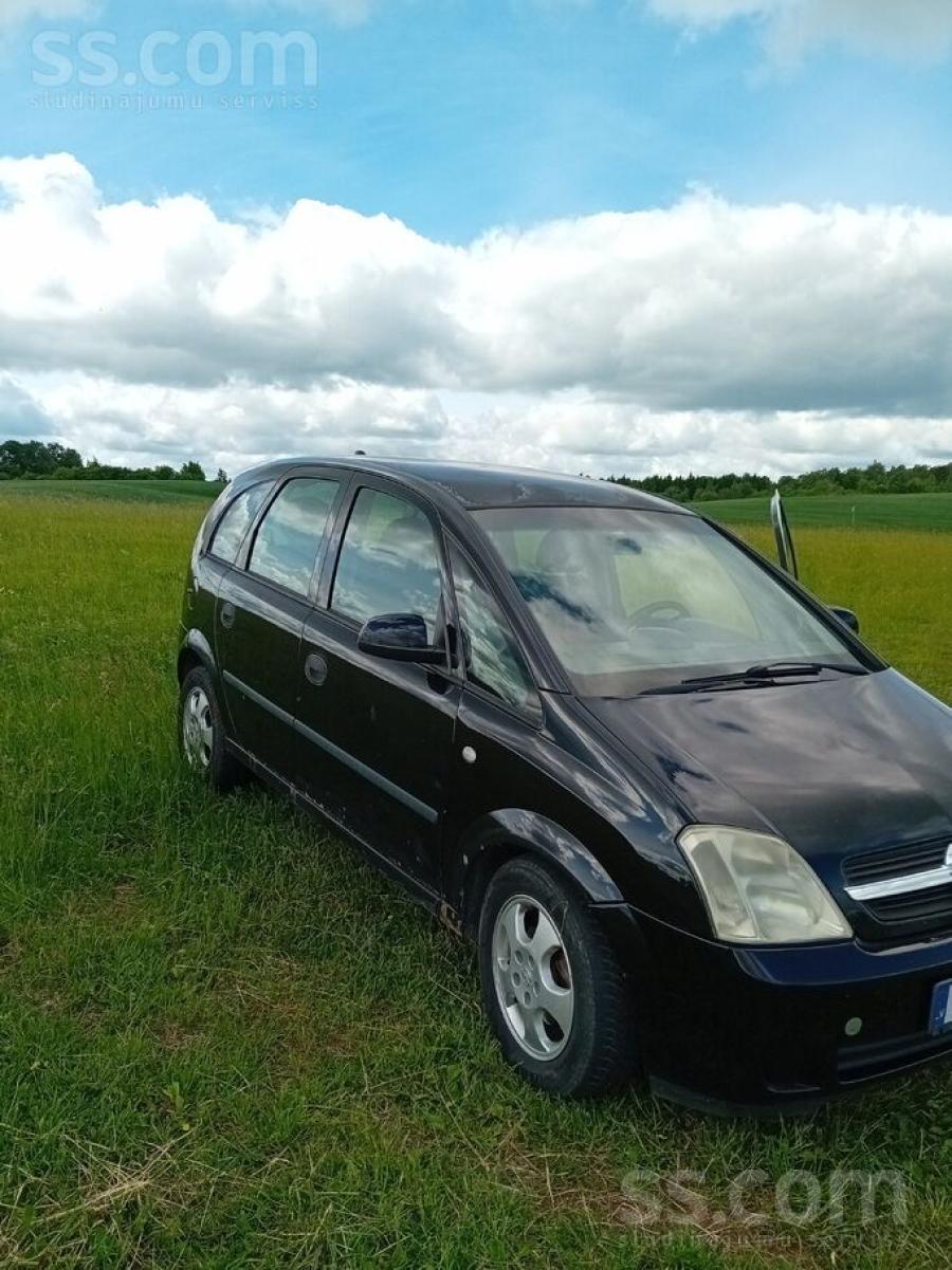 Black Opel Meriva 2004 in Dobele, with an engine capacity of 1.70 L and mileage of 0 thousand km for 640 €, photo 4 on AUTOMOTO.COM.LV