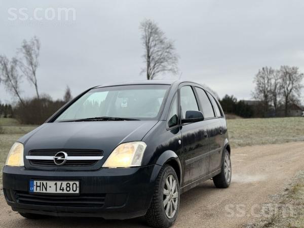 Black Opel Meriva 2005 in Cesis, with an engine capacity of 1.70 L and mileage of 218 thousand km for 1100 €, photo 1 on AUTOMOTO.COM.LV