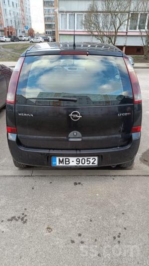Black Opel Meriva 2005 in Riga, with an engine capacity of 1.70 L and mileage of 166 thousand km for 1500 €, photo 5 on AUTOMOTO.COM.LV