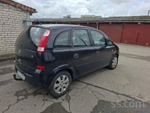 Black Opel Meriva 2005 in Riga, with an engine capacity of 1.60 L and mileage of 236 thousand km for 1559 €, photo 4 on AUTOMOTO.COM.LV