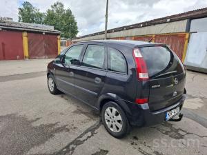 Black Opel Meriva 2005 in Riga, with an engine capacity of 1.60 L and mileage of 236 thousand km for 1559 €, photo 5 on AUTOMOTO.COM.LV