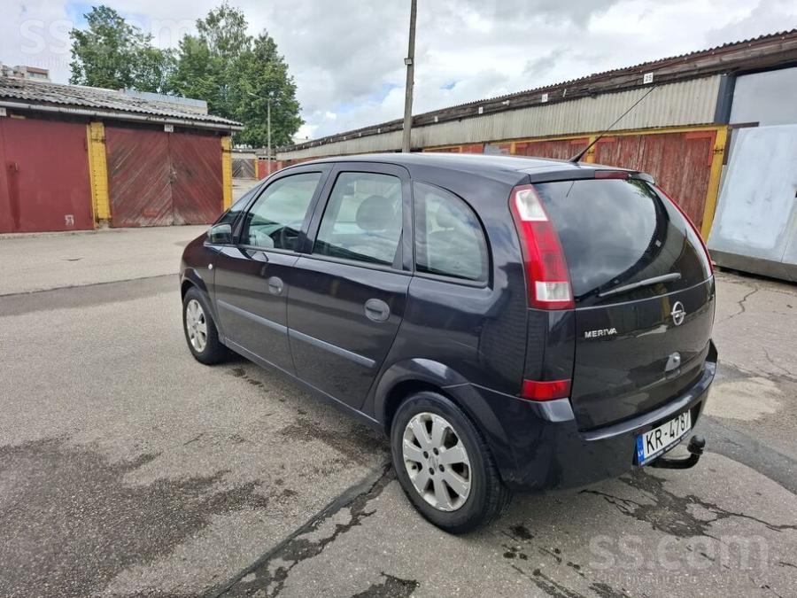 Black Opel Meriva 2005 in Riga, with an engine capacity of 1.60 L and mileage of 236 thousand km for 1559 €, photo 5 on AUTOMOTO.COM.LV
