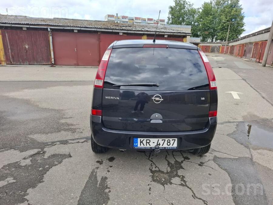 Black Opel Meriva 2005 in Riga, with an engine capacity of 1.60 L and mileage of 236 thousand km for 1559 €, photo 6 on AUTOMOTO.COM.LV