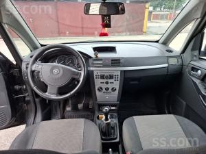 Black Opel Meriva 2005 in Riga, with an engine capacity of 1.60 L and mileage of 236 thousand km for 1559 €, photo 7 on AUTOMOTO.COM.LV