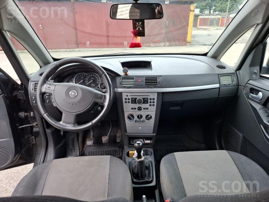 Black Opel Meriva 2005 in Riga, with an engine capacity of 1.60 L and mileage of 236 thousand km for 1559 €, photo 7 on AUTOMOTO.COM.LV