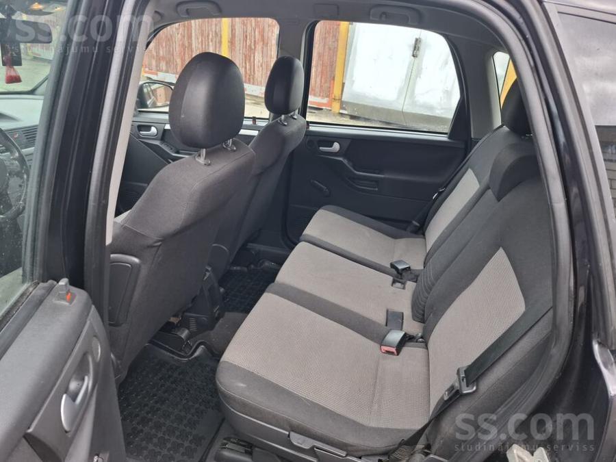 Black Opel Meriva 2005 in Riga, with an engine capacity of 1.60 L and mileage of 236 thousand km for 1559 €, photo 8 on AUTOMOTO.COM.LV