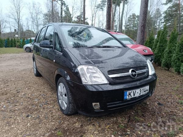Black Opel Meriva 2005 in Riga, with an engine capacity of 1.30 L and mileage of 320 thousand km for 1150 €, photo 3 on AUTOMOTO.COM.LV
