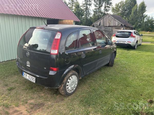 Black Opel Meriva 2005 in Daugavpils, with an engine capacity of 1.60 L and mileage of 323 thousand km for 800 €, photo 8 on AUTOMOTO.COM.LV